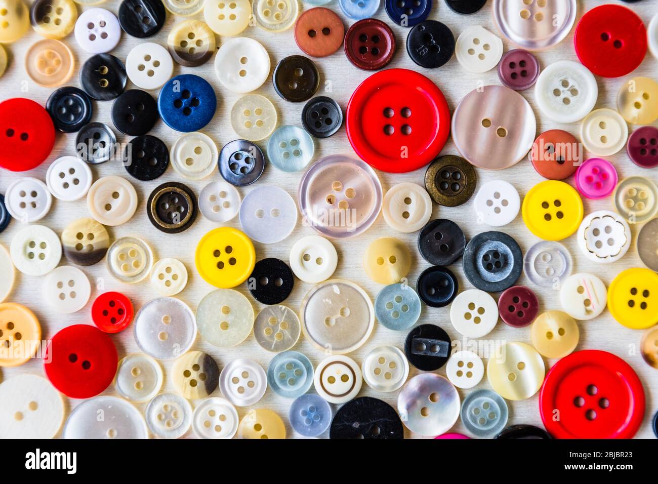 Collection of clothing buttons of various sizes and colors Stock Photo ...