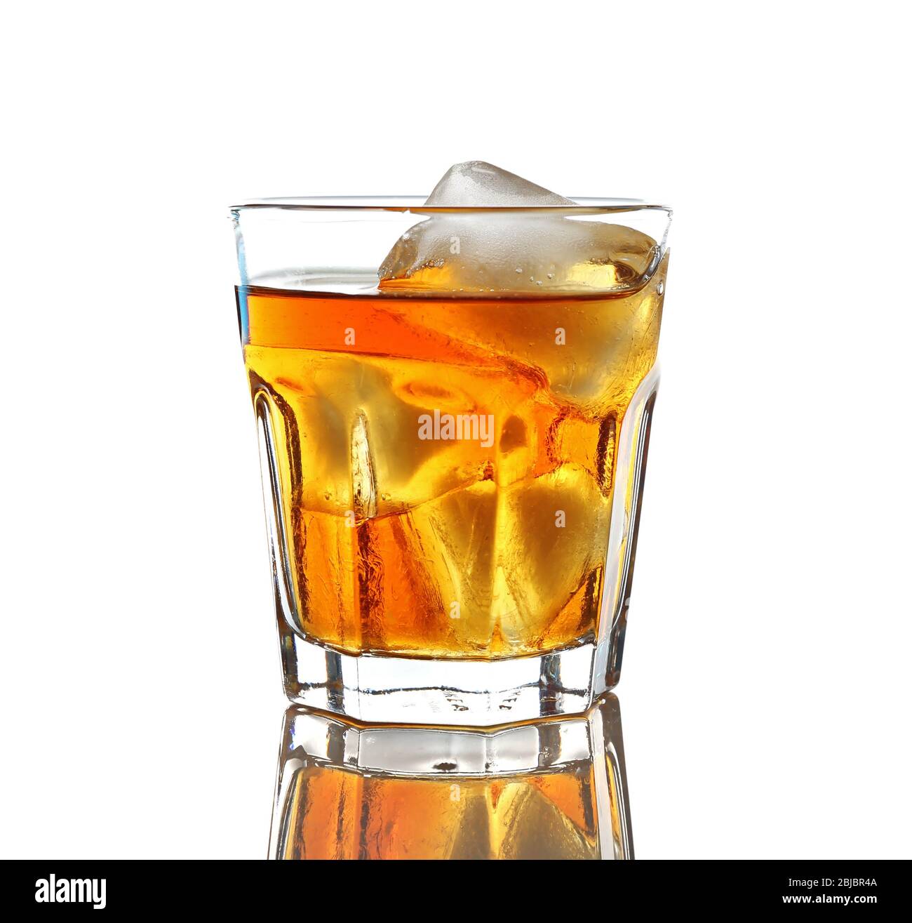 Glass of whisky with ice isolated on white Stock Photo - Alamy