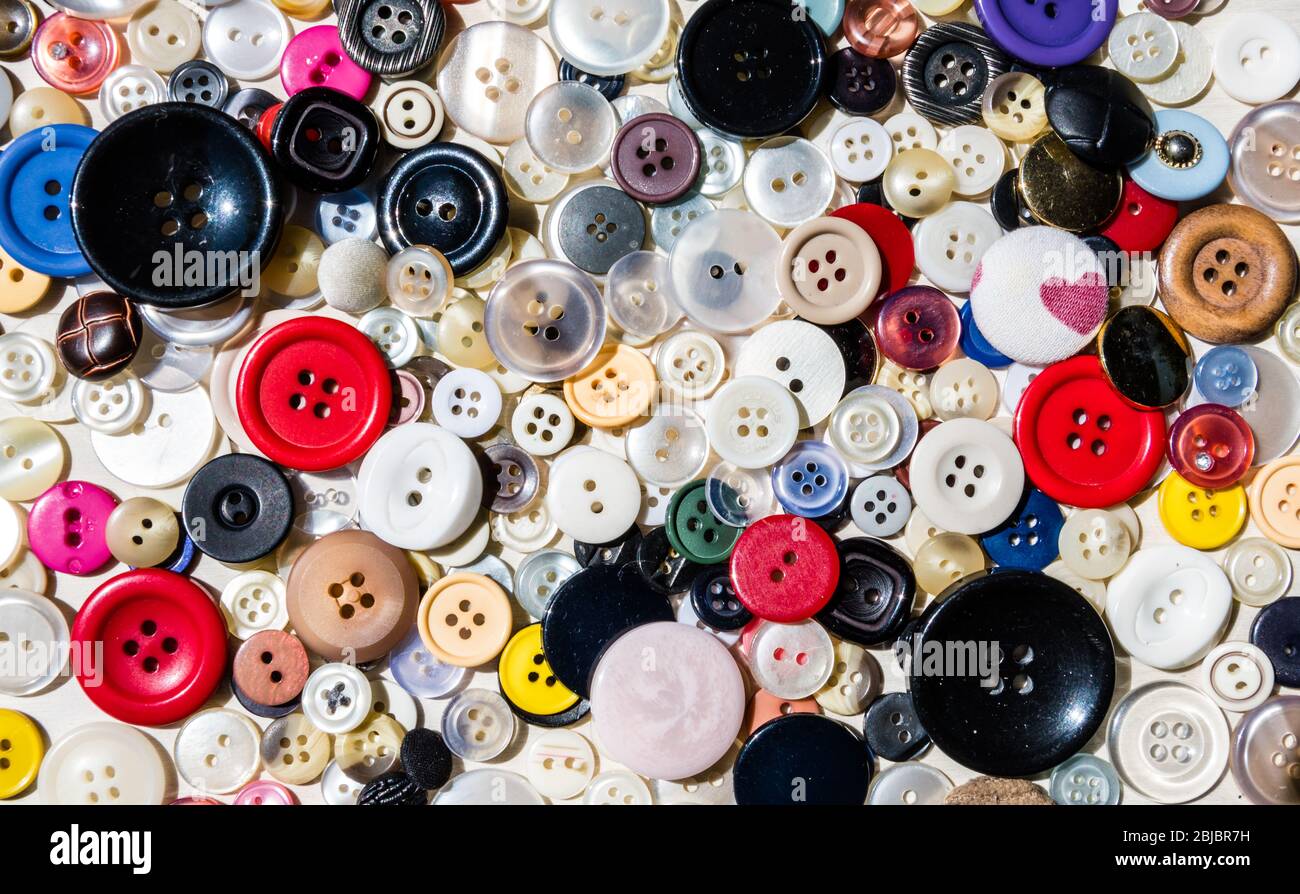 Collection of clothing buttons of various sizes and colors Stock Photo ...