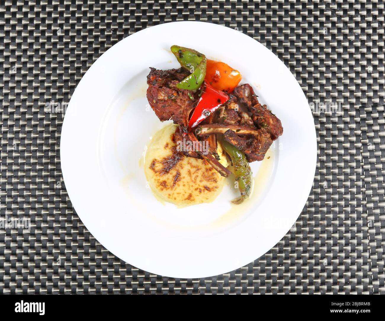 Grilled Lamb Meat with Smashed Potato Stock Photo - Alamy