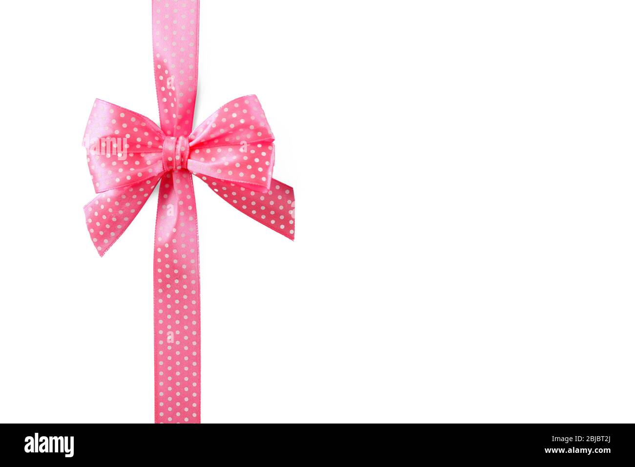Beautiful pink ribbon with bow on white background Stock Photo - Alamy