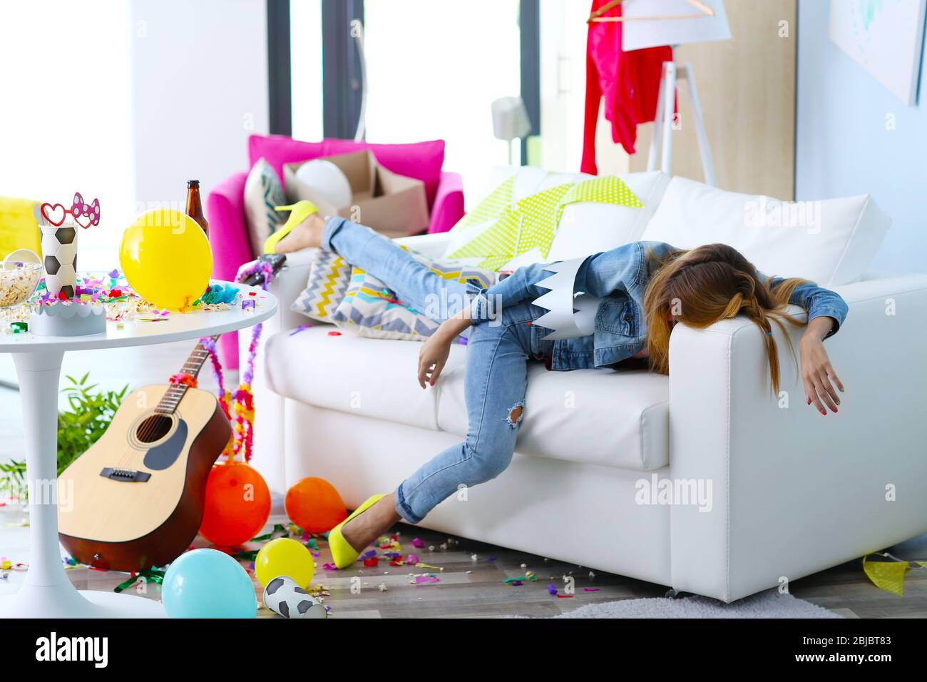 Tired woman after party at home Stock Photo - Alamy