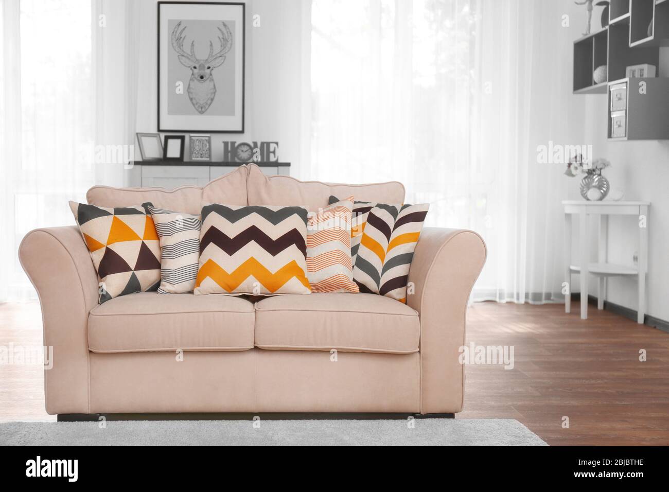 Modern home interior with couch Stock Photo - Alamy