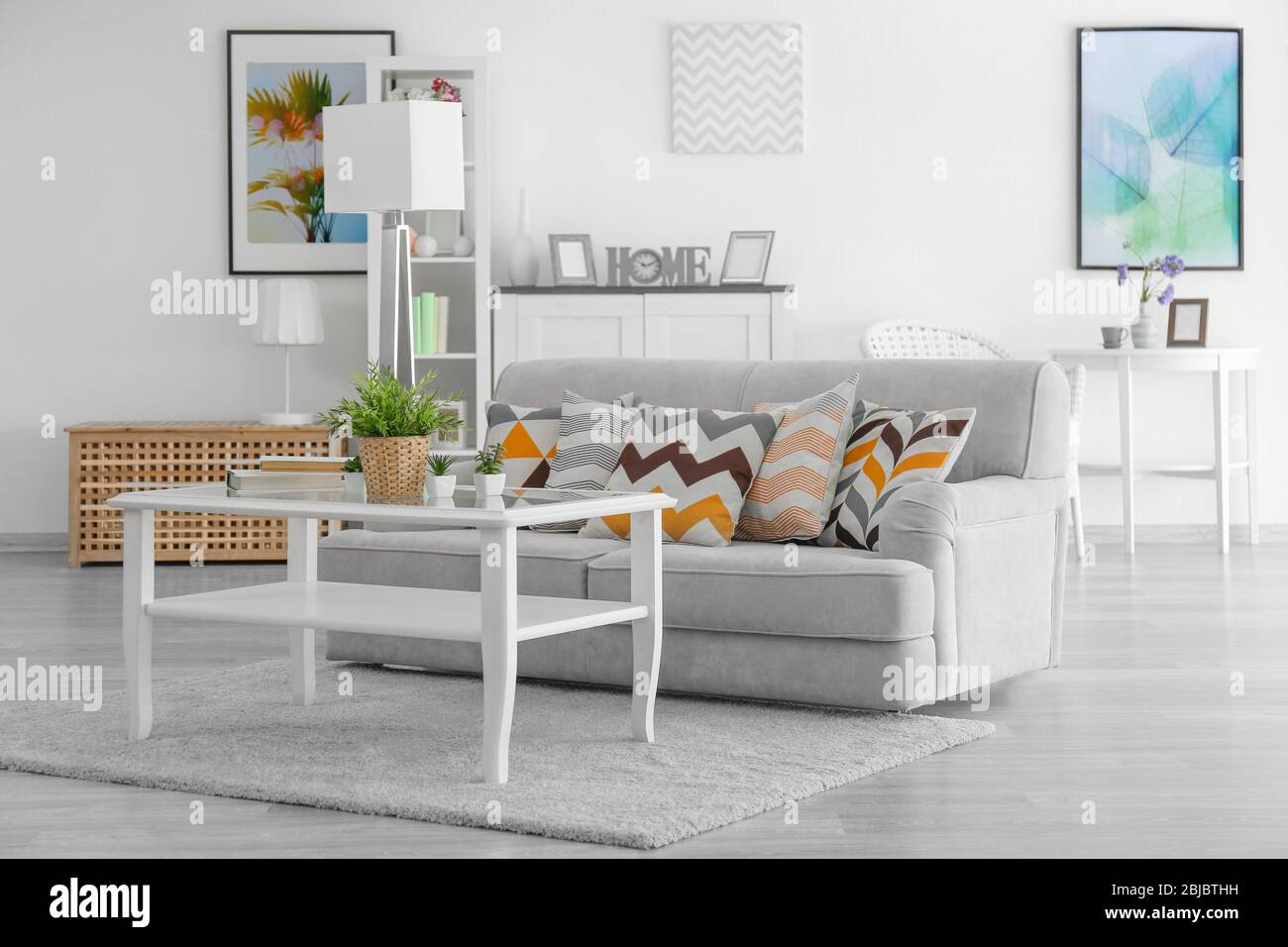 Modern home interior with couch Stock Photo - Alamy