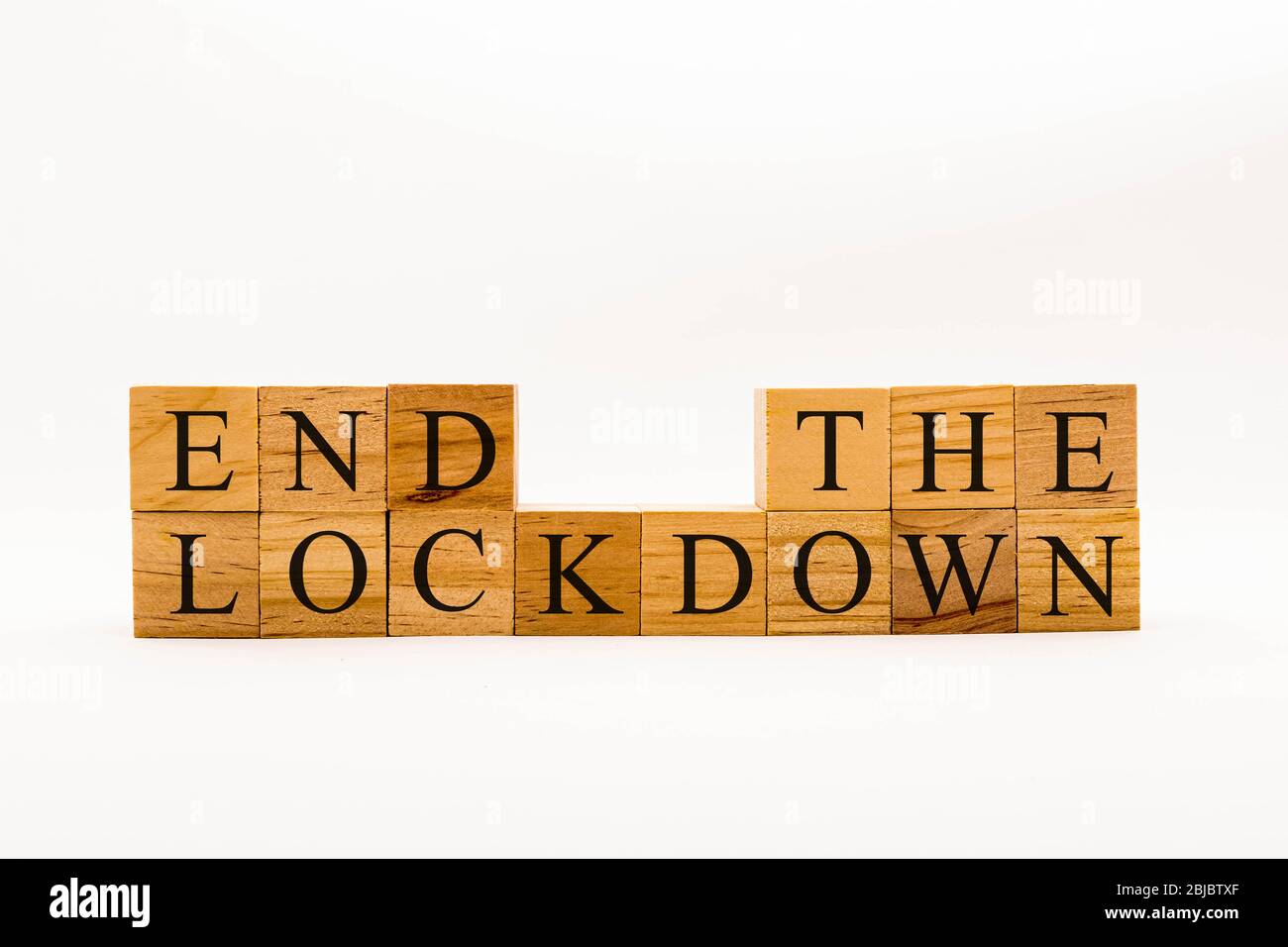 Coronavirus concept showing wooden blocks on a white background reading ...