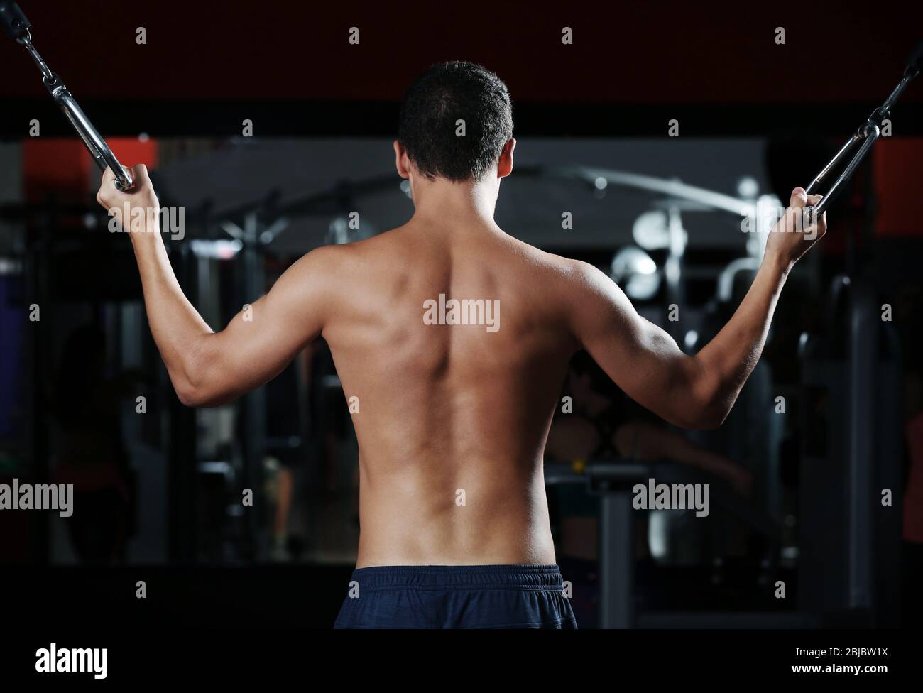 Male training back hands muscles hi-res stock photography and images ...