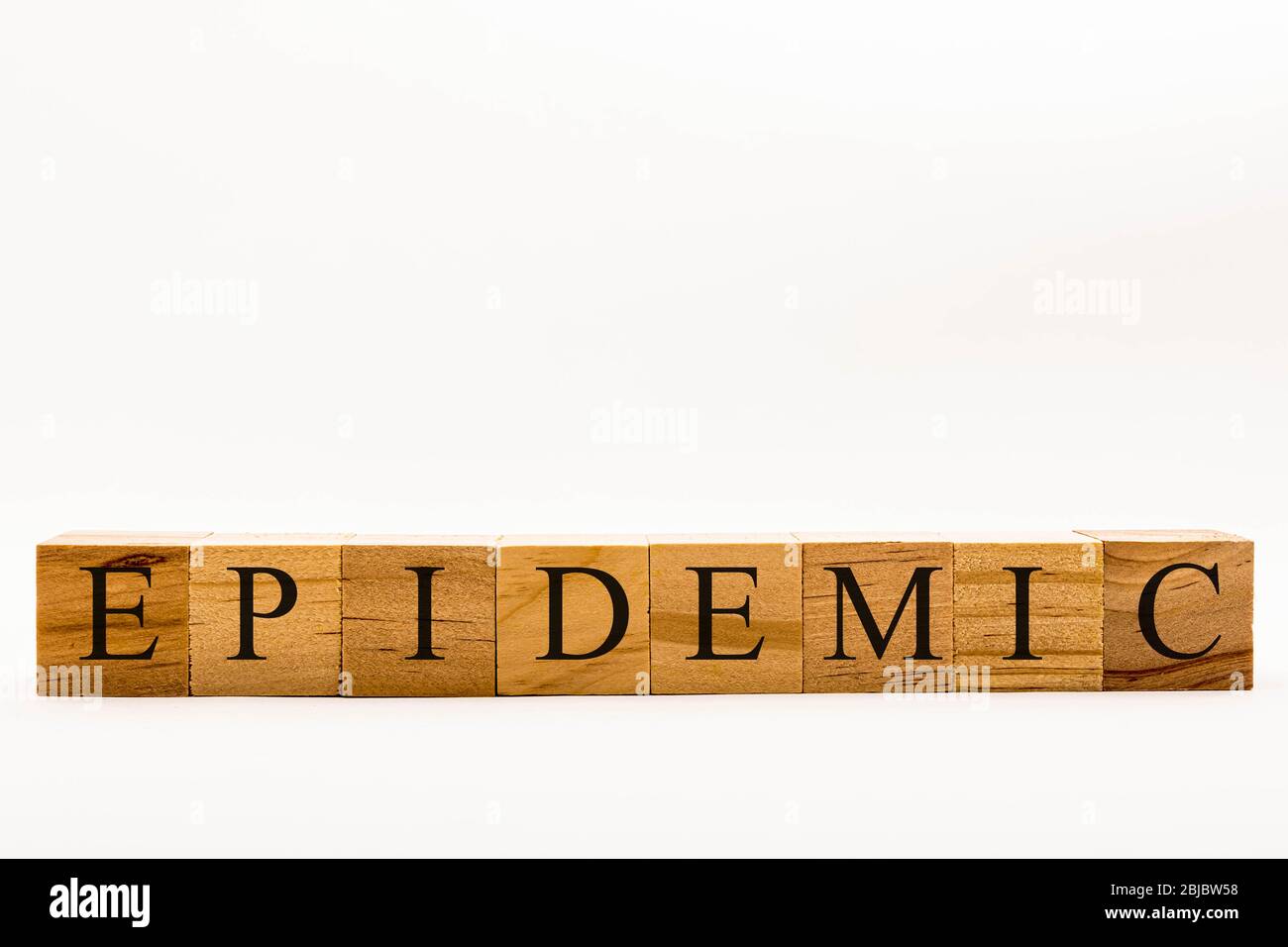 Coronavirus concept showing wooden blocks on a white background reading ...