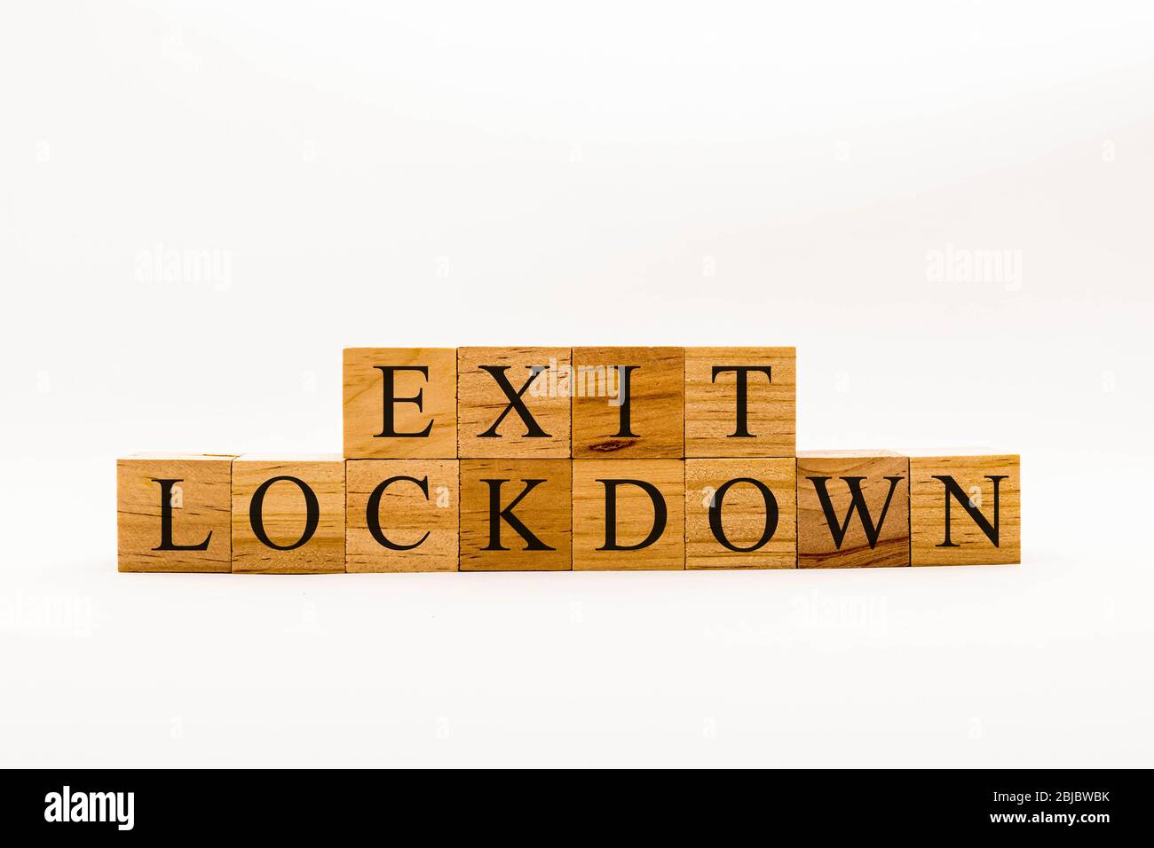 Coronavirus concept showing wooden blocks on a white background reading ...