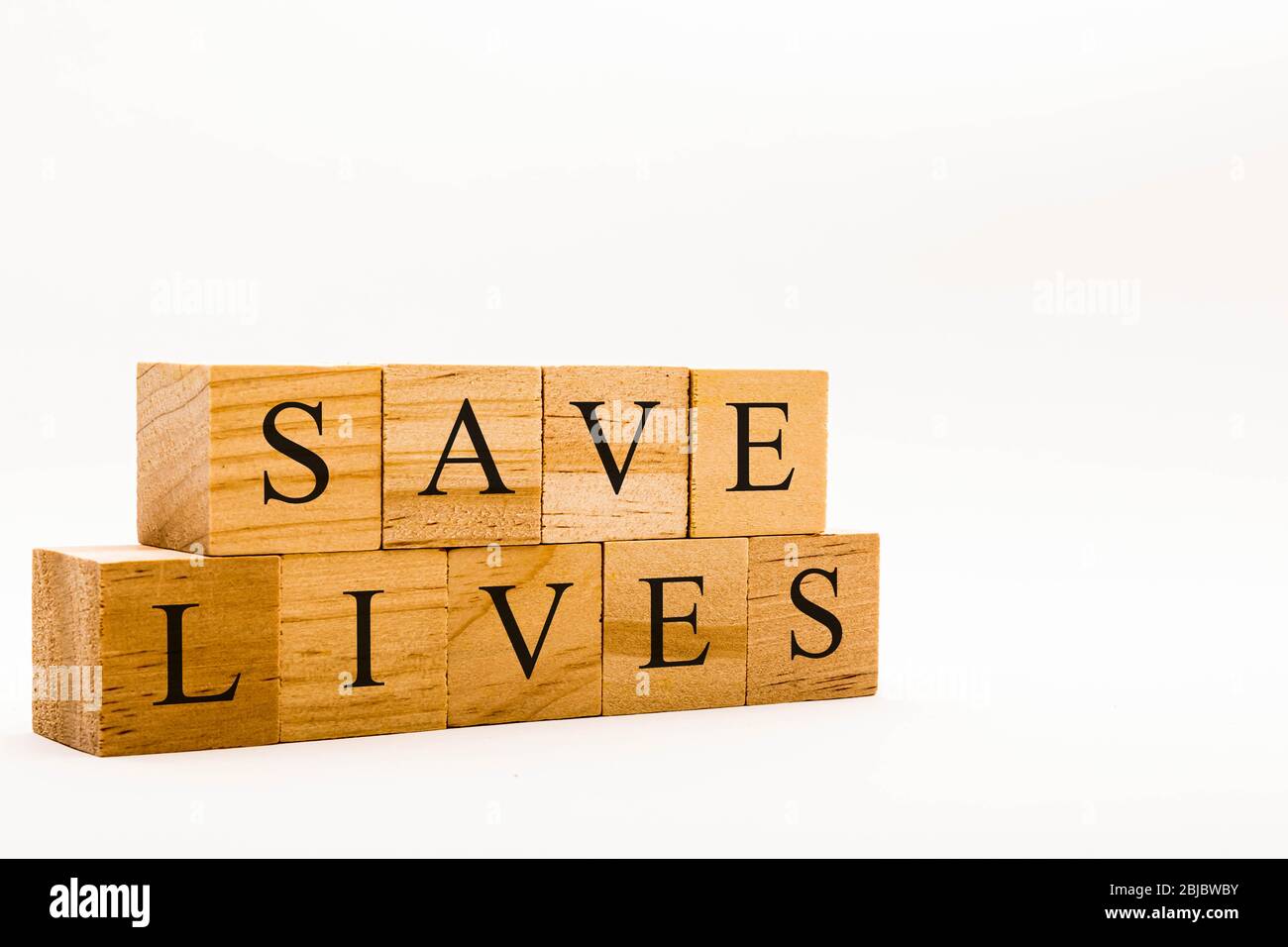 Coronavirus concept showing wooden blocks on a white background reading ...