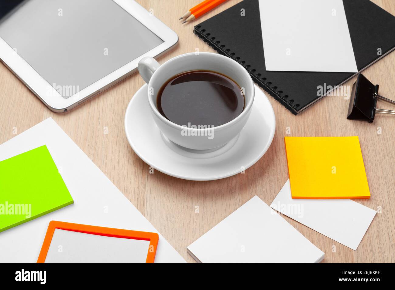 Corporate identity design template on wooden desk close up Stock Photo ...