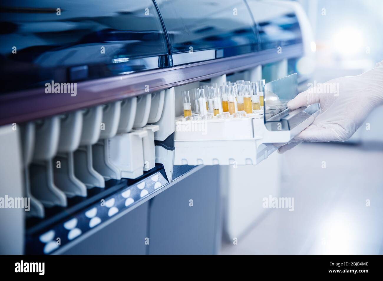 Blood test scientist working with auto robot laboratory medical ...