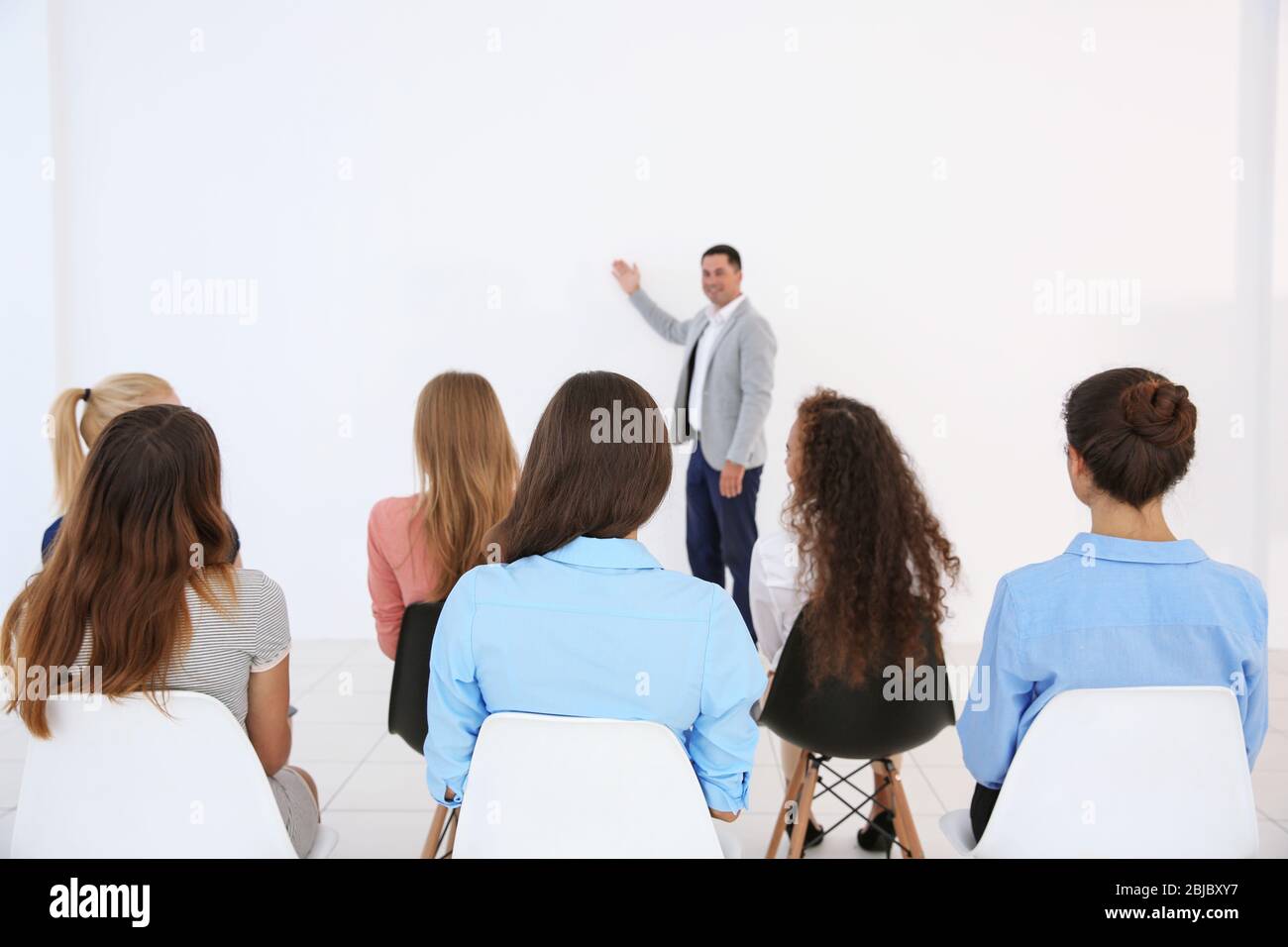 Group of people at business presentation Stock Photo - Alamy