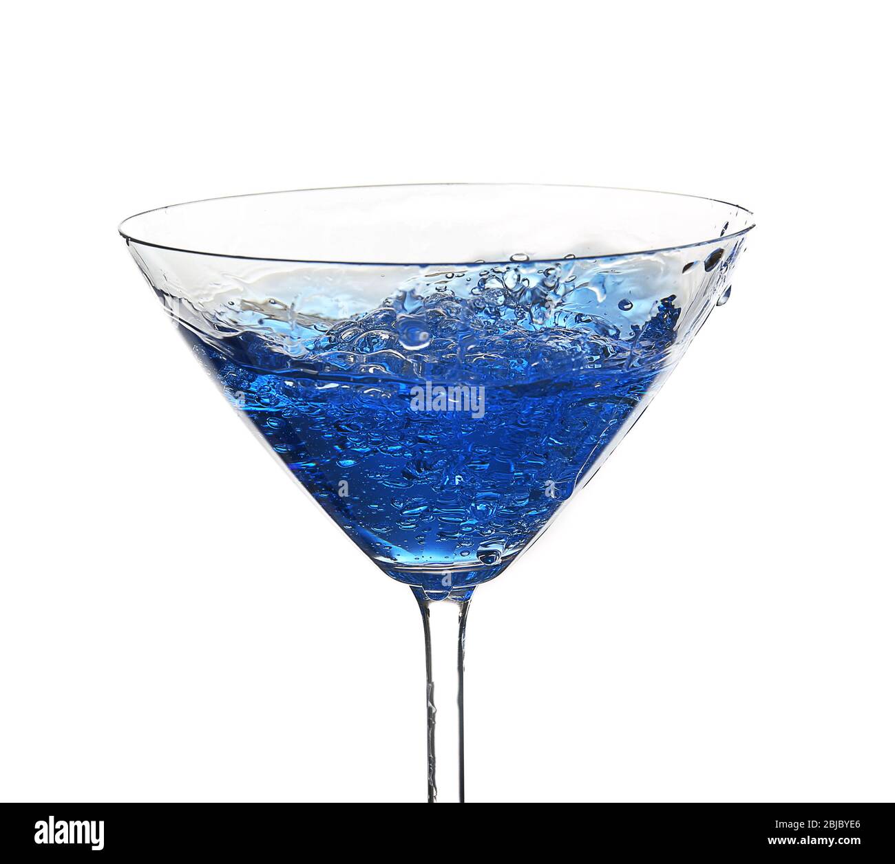 Blue cocktail with splash on white background Stock Photo - Alamy
