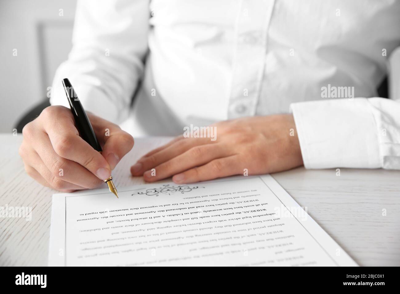 Man signing marriage contract, closeup Stock Photo - Alamy