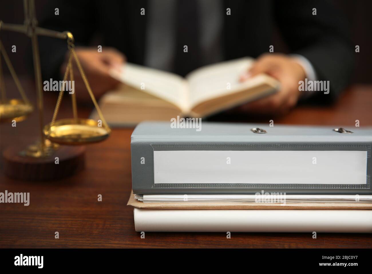 Folder on lawyer table, closeup Stock Photo - Alamy