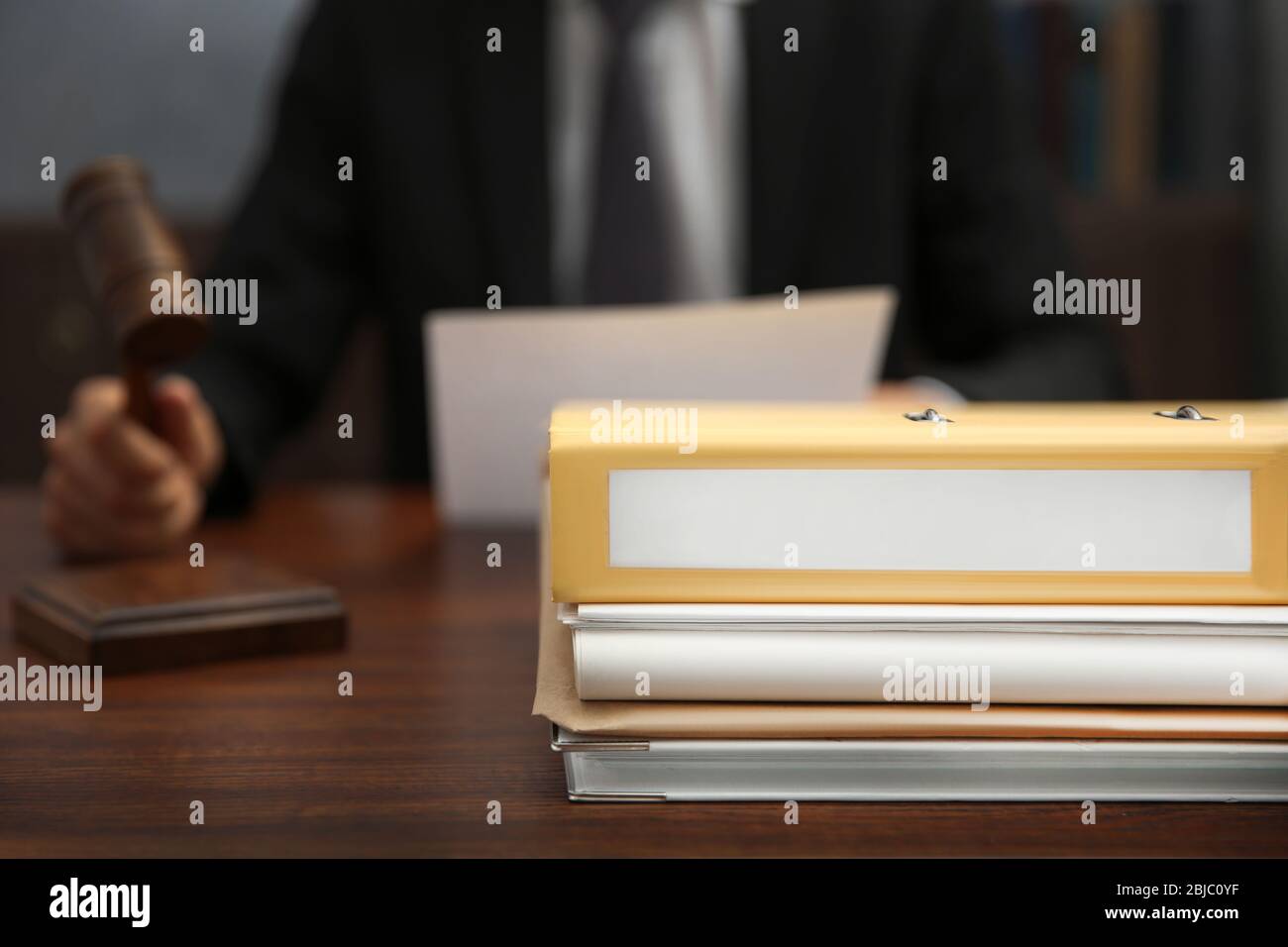 Folder on judge table, closeup Stock Photo - Alamy