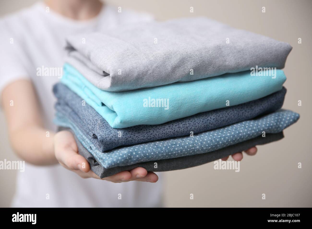 Different hands in pile hi-res stock photography and images - Alamy