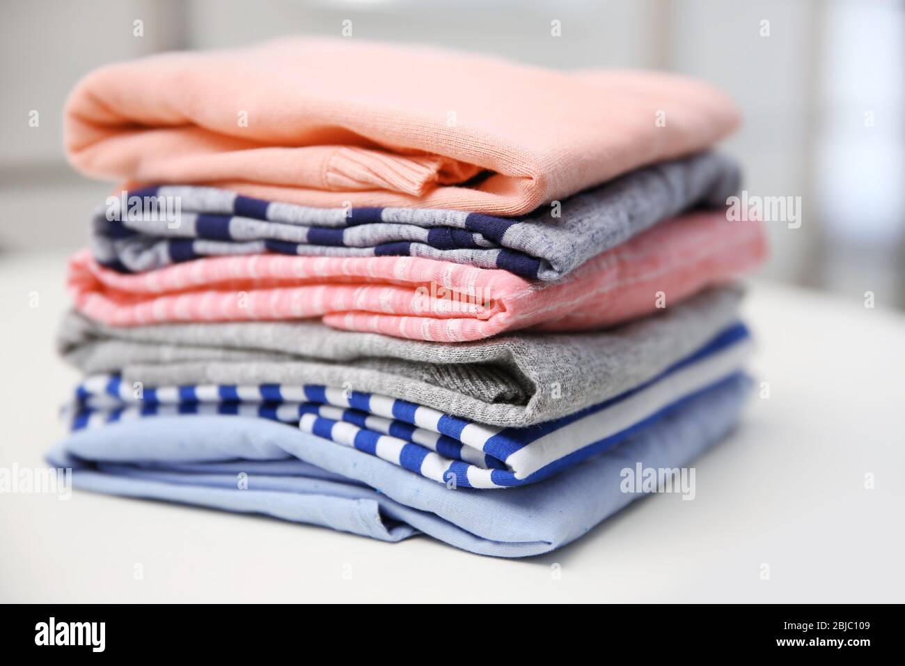Folded clothes hi-res stock photography and images - Alamy