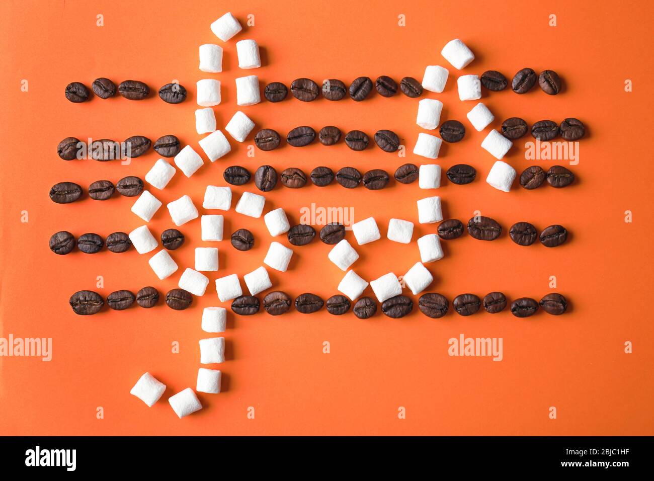 Composition of treble clef and musical note made of marshmallow and ...