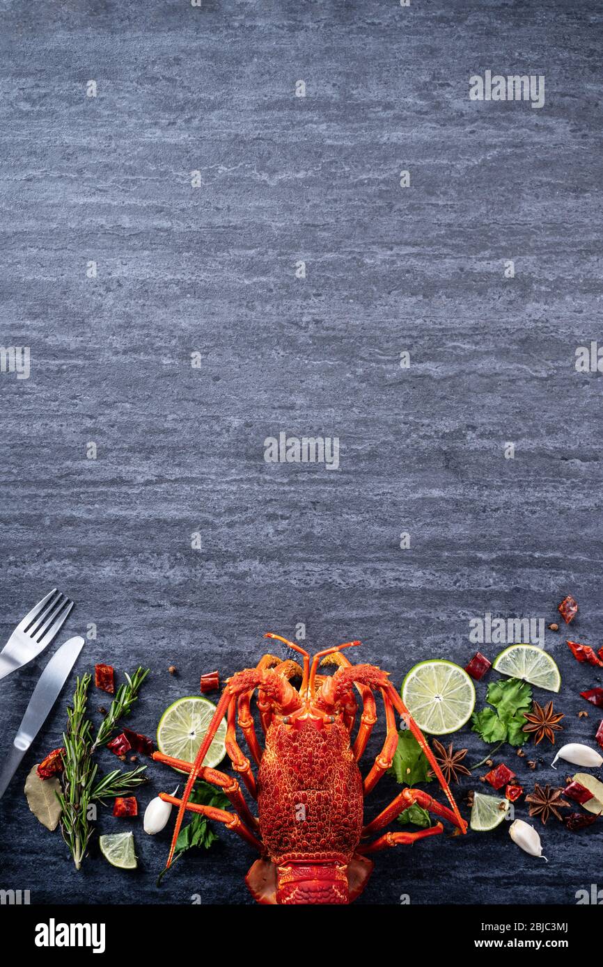 Cooked boiled lobster, delicious dinner seafood meal set with knife and ...