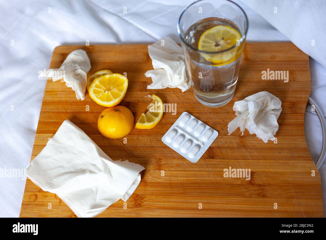 Healthcare & Medical illness concept - A glass of lemon infused water ...
