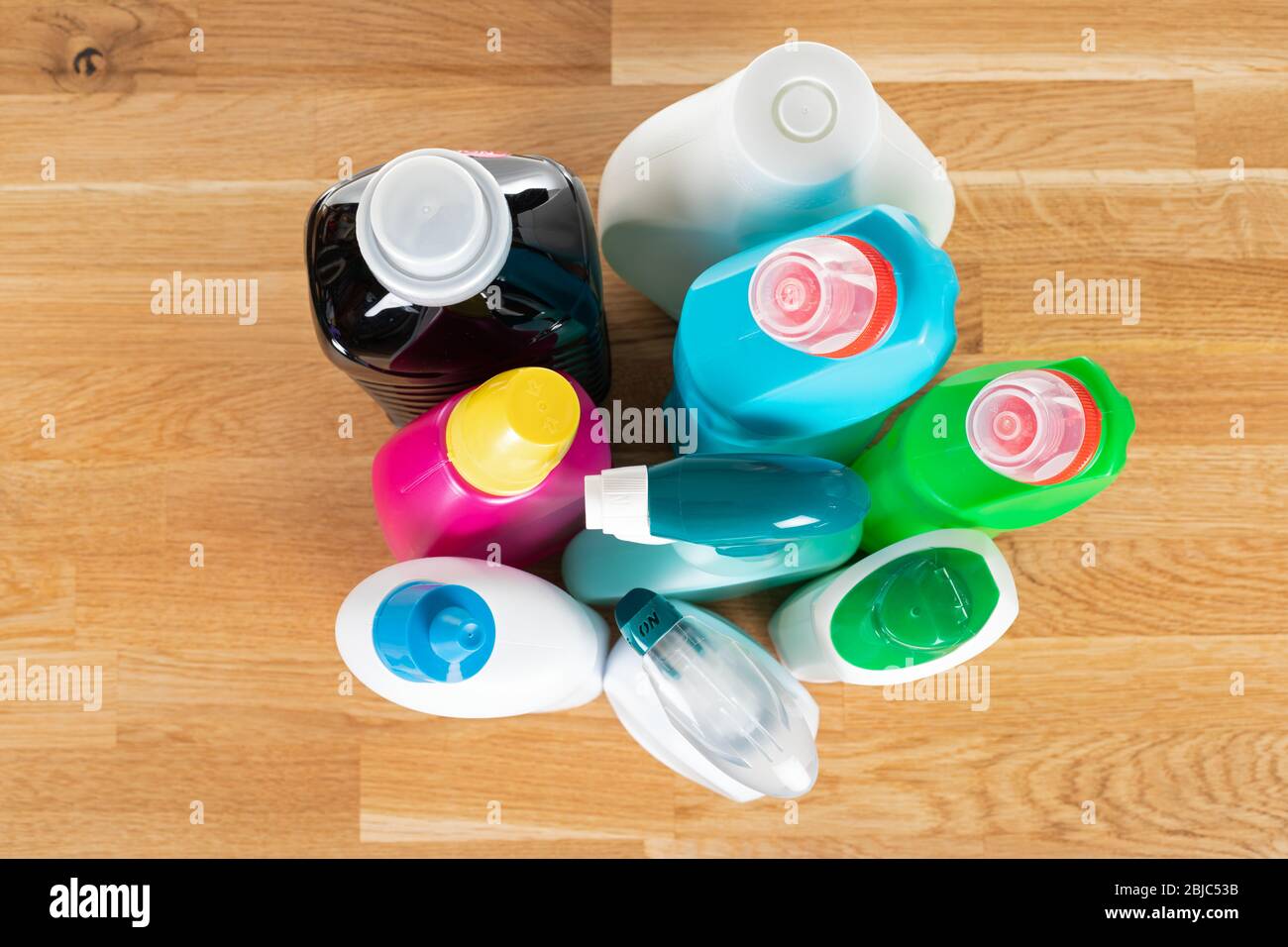 Top view of cleaning supplies and sanitary equipment on wooden ...