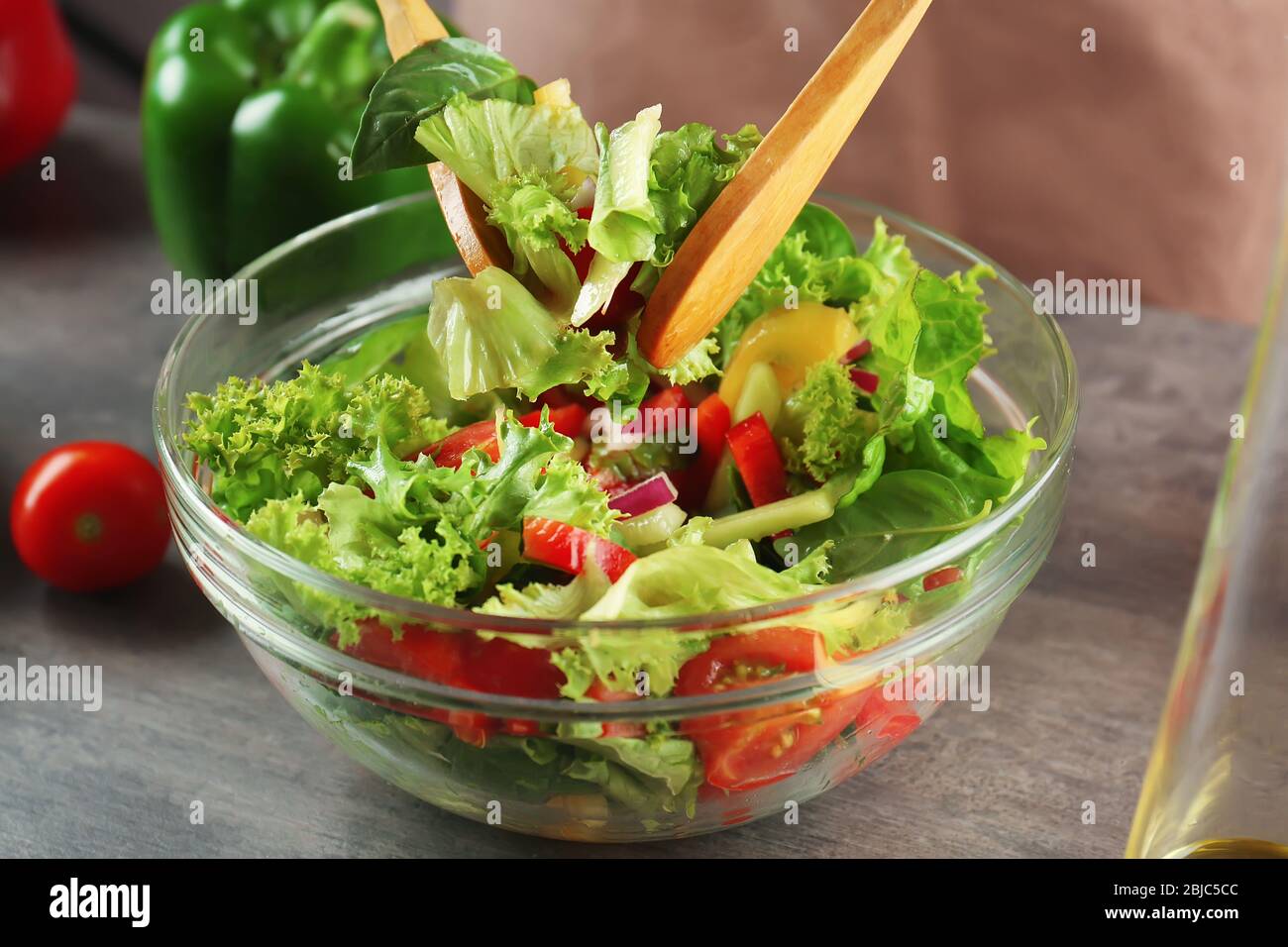 Cooking salad mixing ingredients green hi-res stock photography and ...