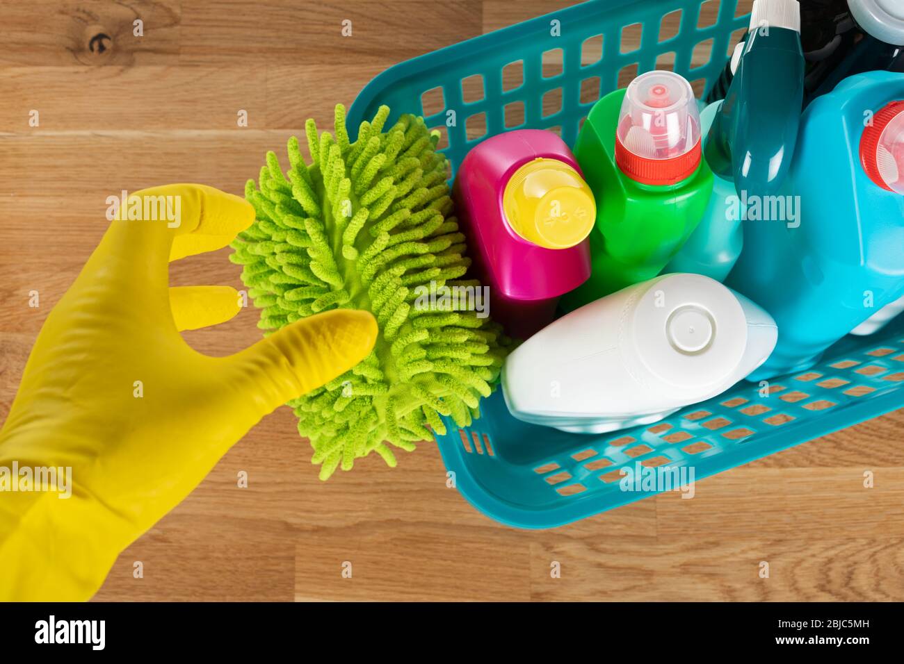 Top view of cleaning supplies and sanitary equipment on wooden ...