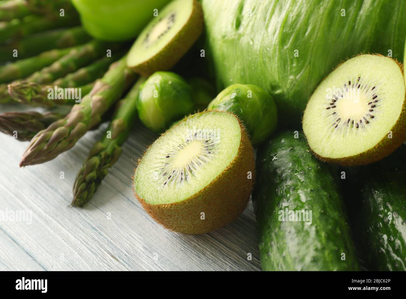 Green vegetables and fruits, close up Stock Photo - Alamy