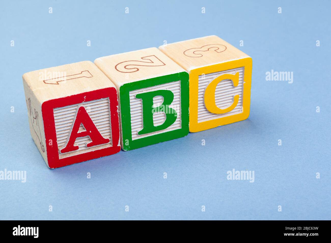 Alphabet blocks ABC close up, education concept Stock Photo - Alamy