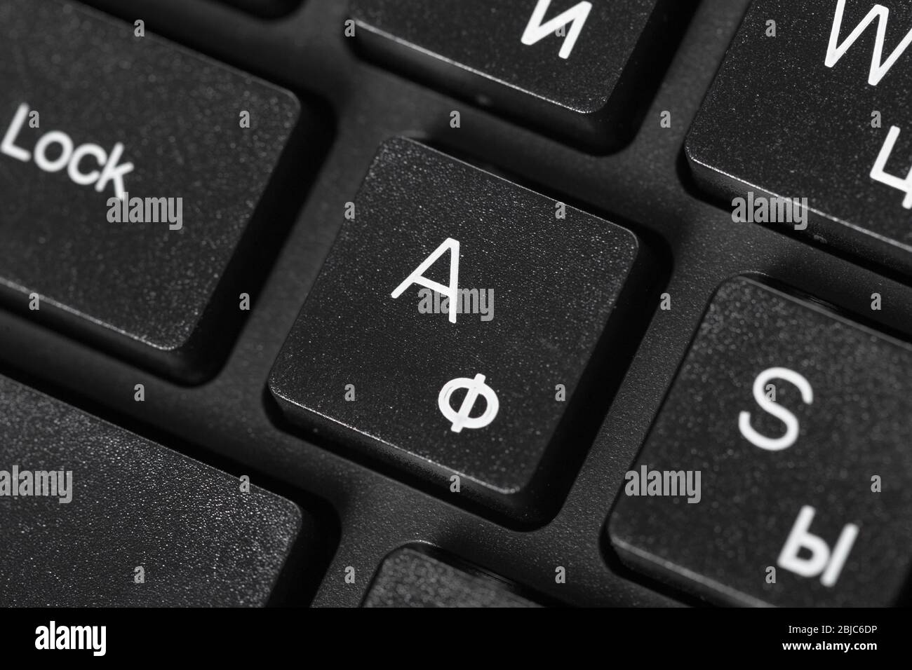 Black laptop keyboard. Macro photo. Close up Stock Photo - Alamy