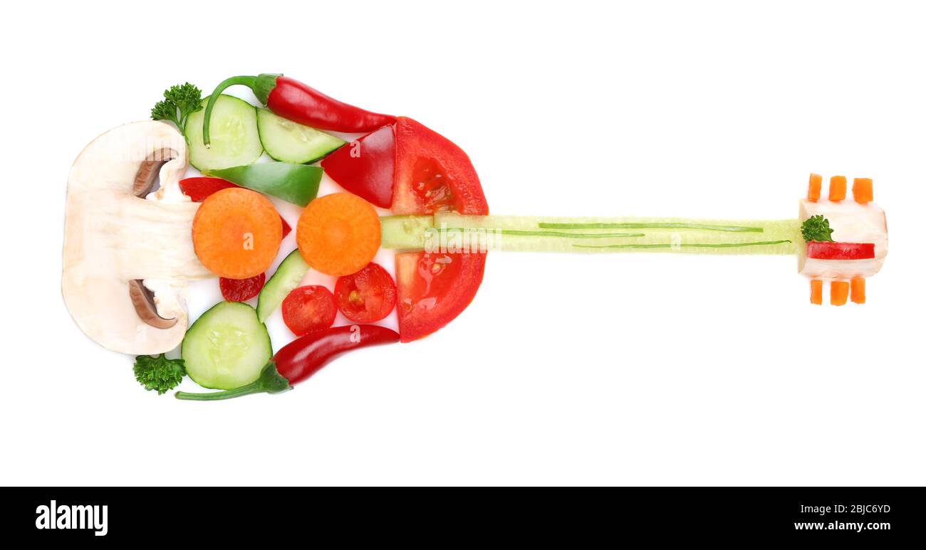 Guitar made of vegetables isolated on white Stock Photo - Alamy