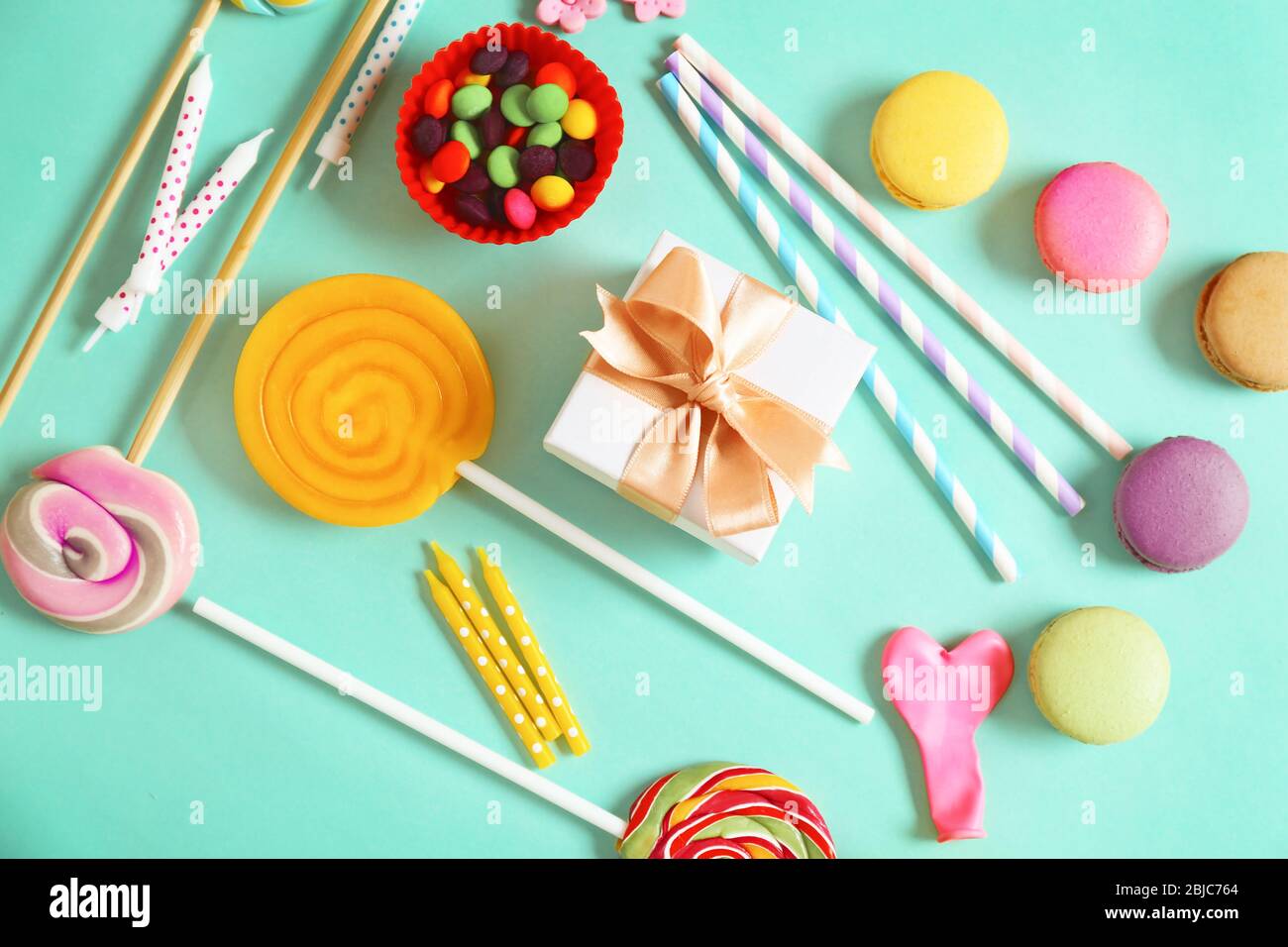 Bright birthday background with sweets and decorations Stock Photo - Alamy