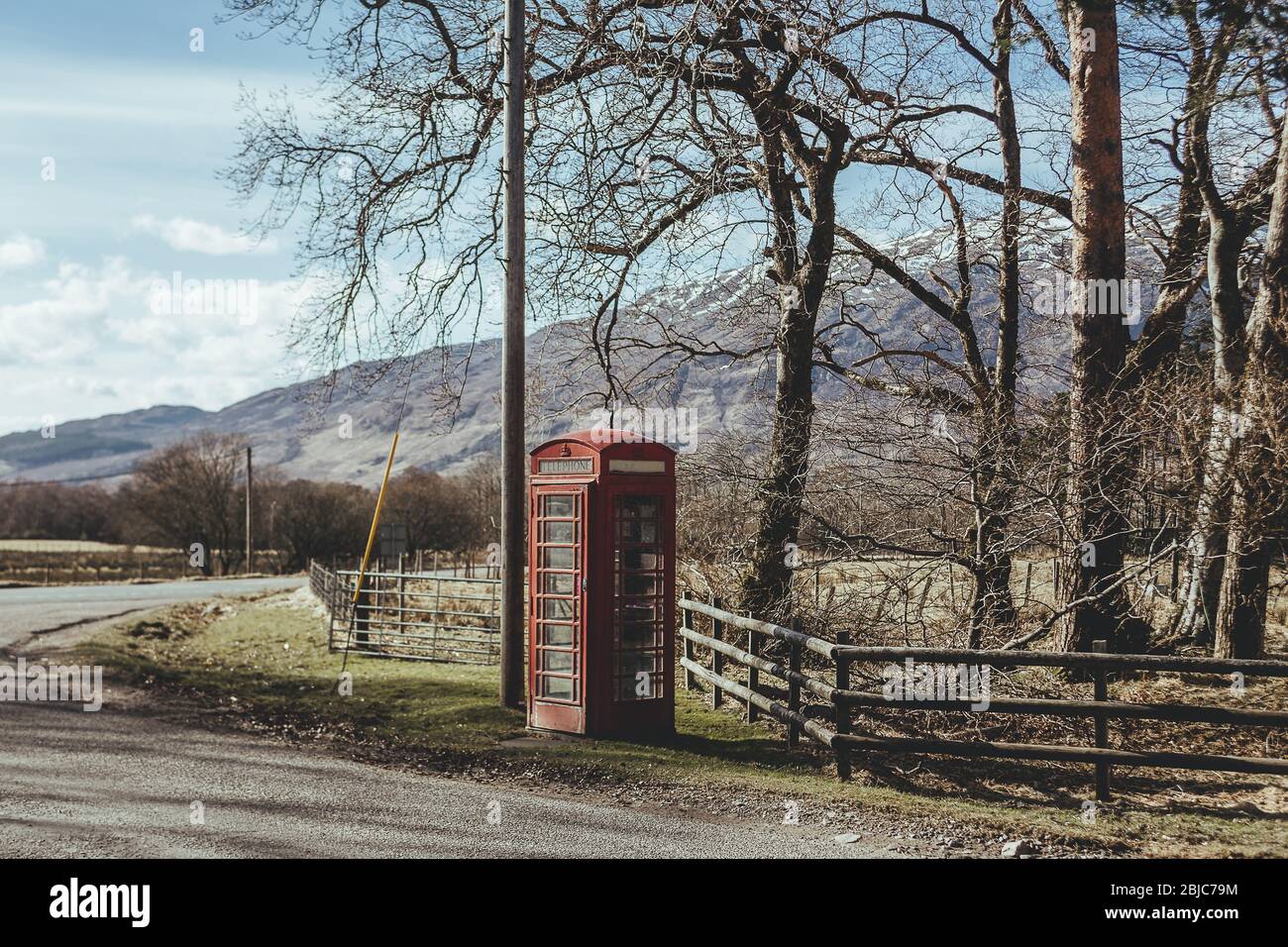 Village with a red telephone box in the scottish highlands hi-res stock ...