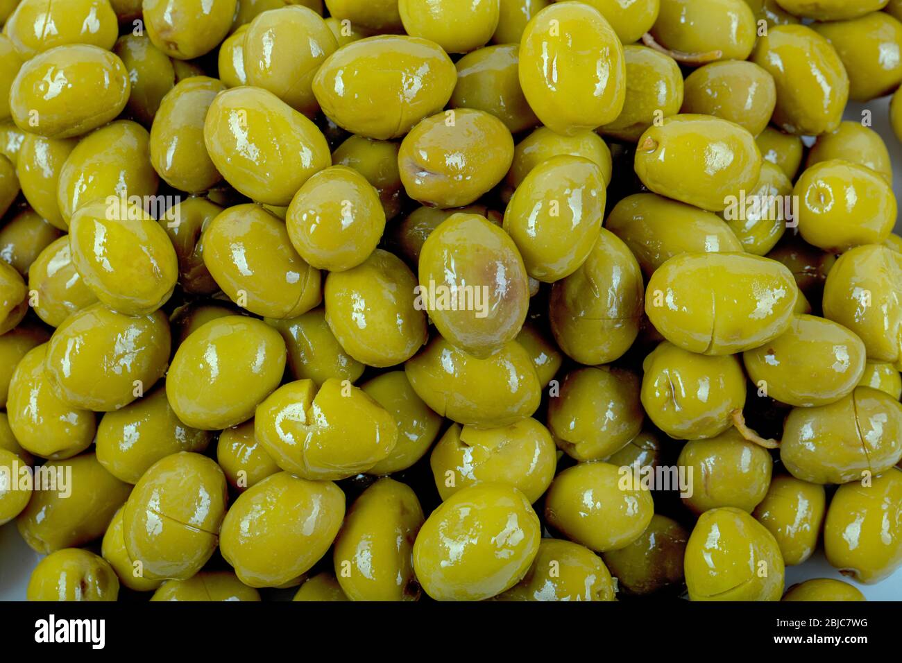 Scratched green olives. Turkish name; cizik yesil zeytin. Brined ...
