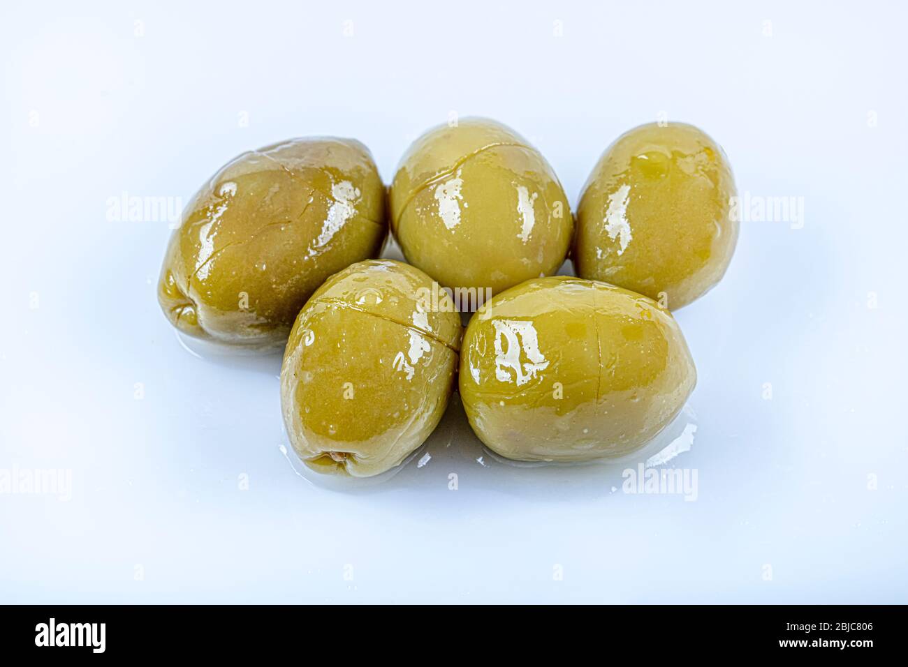 Scratched green olives. Turkish name; cizik yesil zeytin. Brined ...