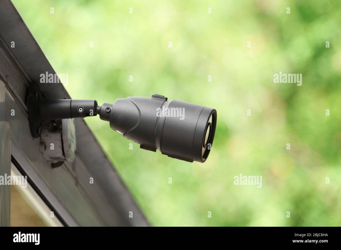 Security CCTV camera on street Stock Photo - Alamy