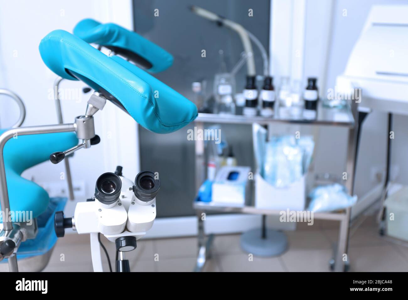 Gynecological room with chair and equipment Stock Photo - Alamy