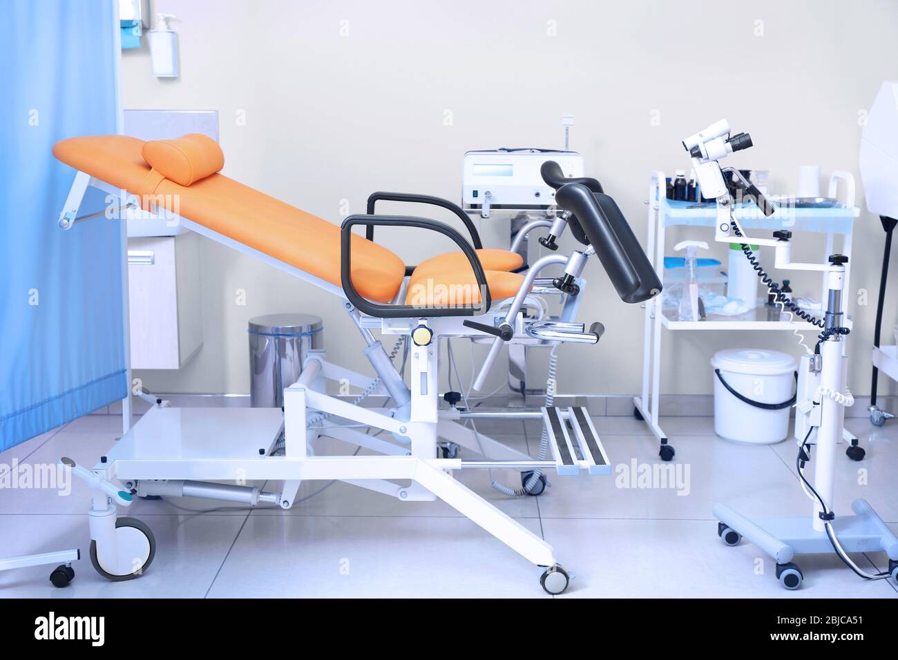 Gynecological room with chair and equipment Stock Photo - Alamy
