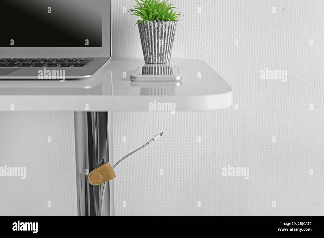 Wire phone holder hi-res stock photography and images - Alamy