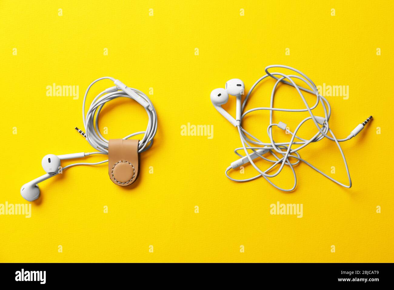 Usage example of multifunctional magnetic clip as earphones cable ...