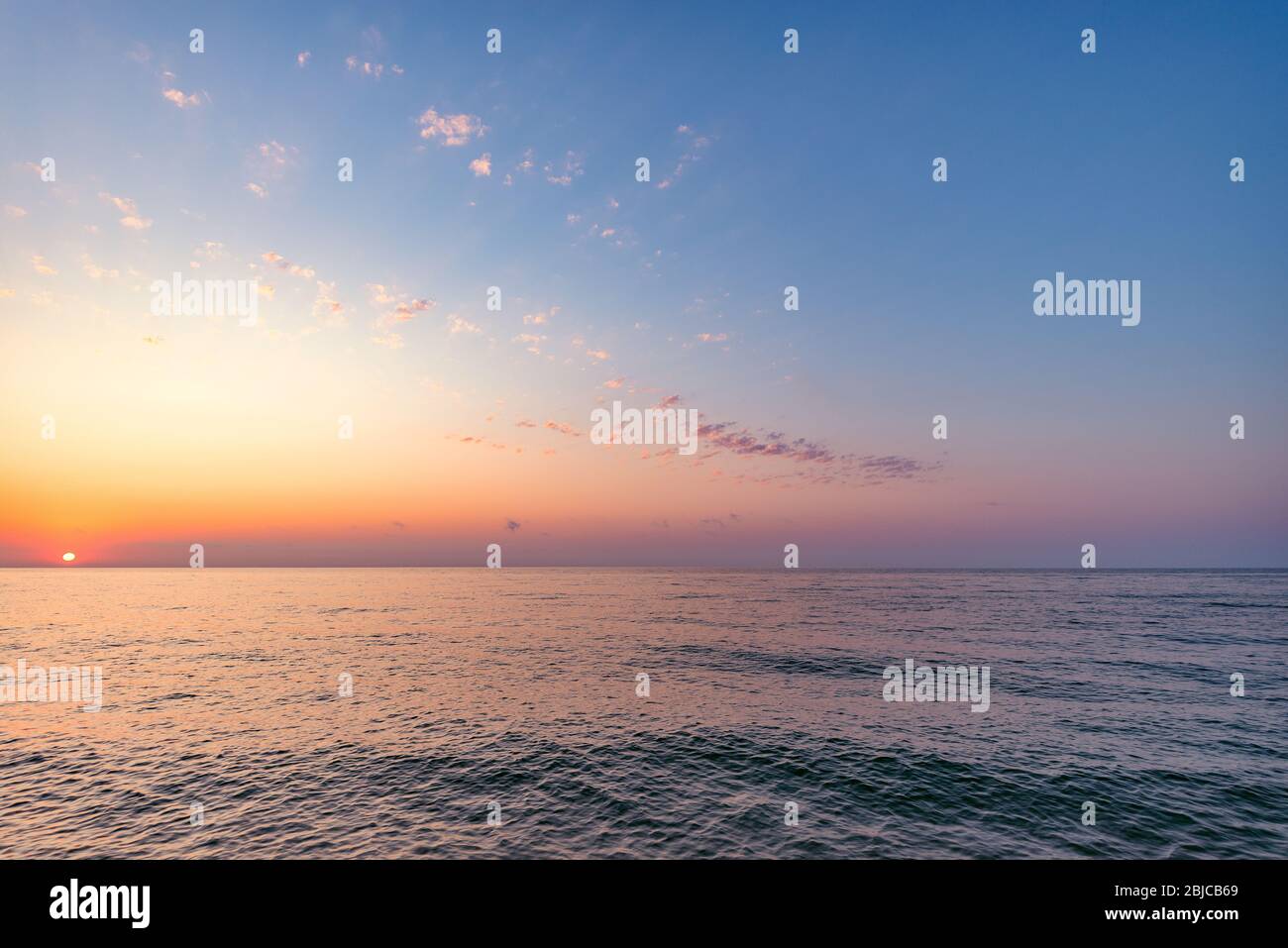 Colorful sky above the sea Stock Photo - Alamy