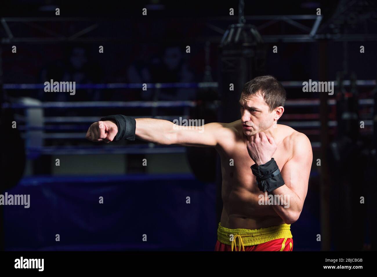 Man boxer in sportswear trains hi-res stock photography and images - Alamy
