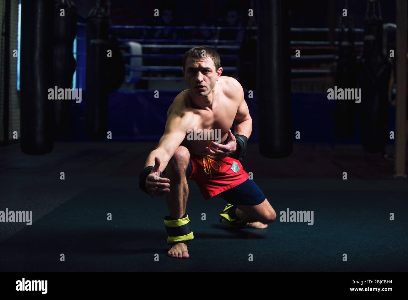 Man boxer in sportswear trains hi-res stock photography and images - Alamy