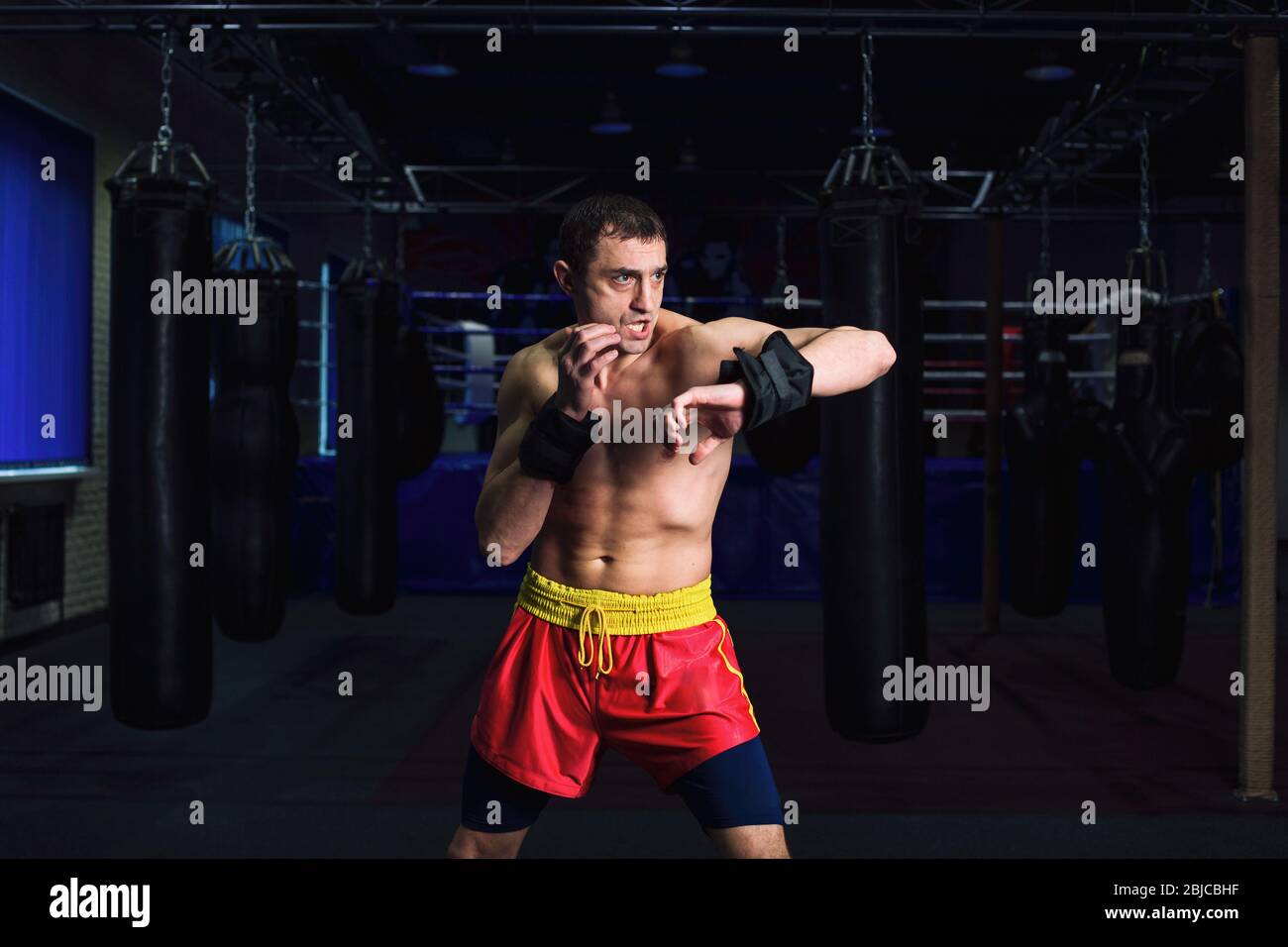Man boxer in sportswear trains hi-res stock photography and images - Alamy