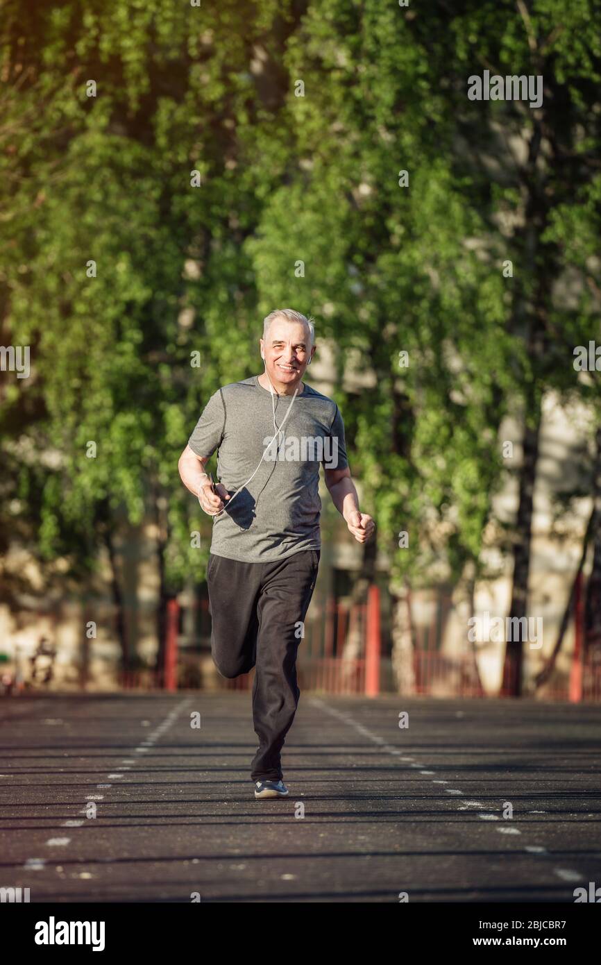 Old Man Running Marathon High Resolution Stock Photography and Images ...