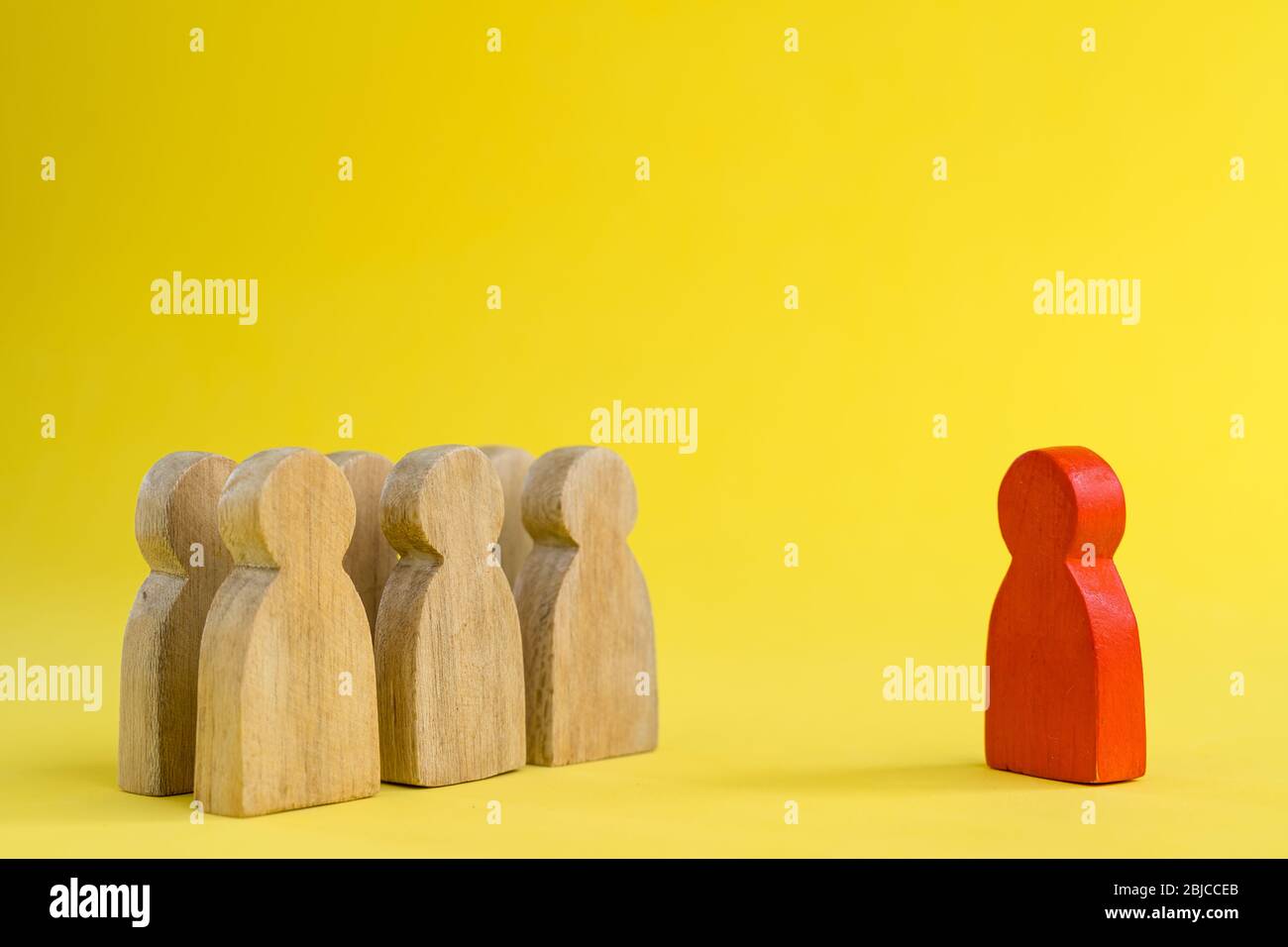 Group of wood figure Stand in rows and leaders standing forward in ...