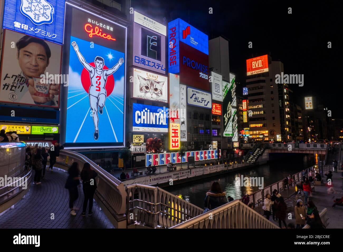 Night View of the famous Glico Running Man billboard in Dotonbori Canal ...