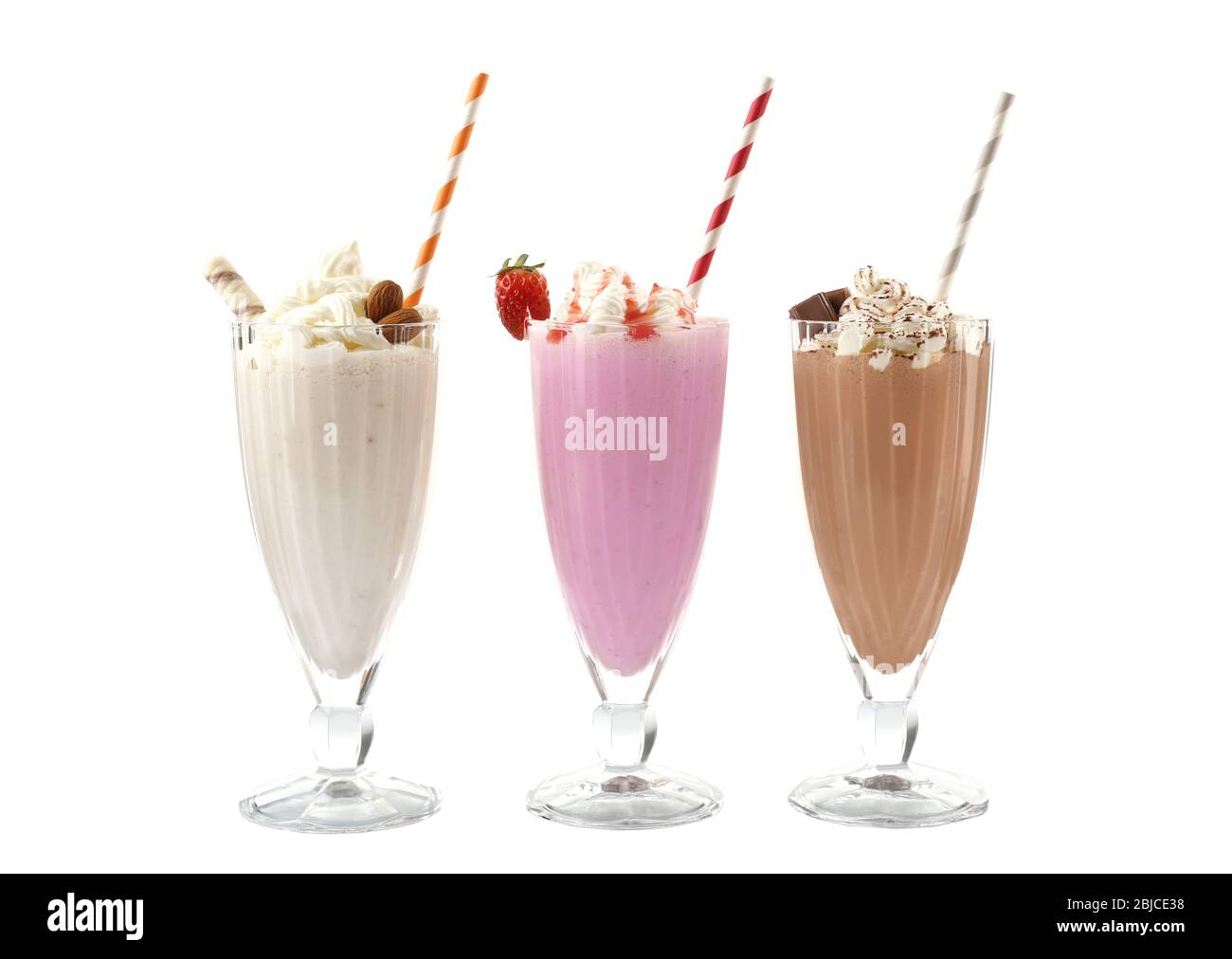 Delicious milkshakes isolated on white Stock Photo - Alamy