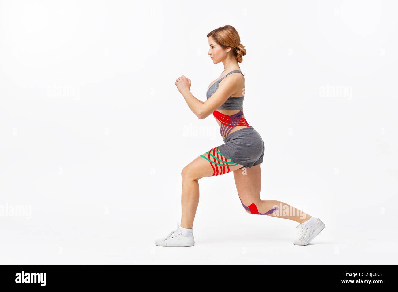 Kinesiology taping. Kinesiology tape on patient knee,hip, should Stock ...